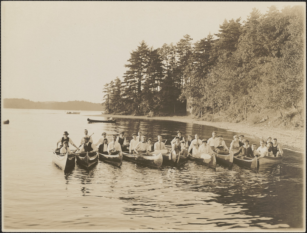 Group of people posing in 10 canoes - Digital Commonwealth