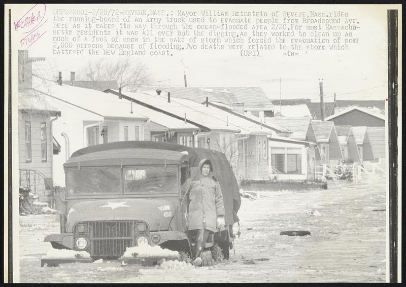 Mayor William Reinstein of Revere, Mass. rides the running-board of an ...
