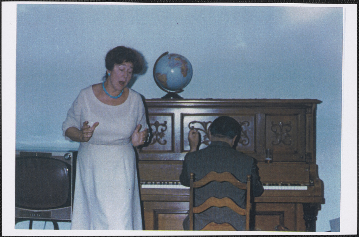 Faith (Phillips) Perera singing, accompanied by her husband Guido ...