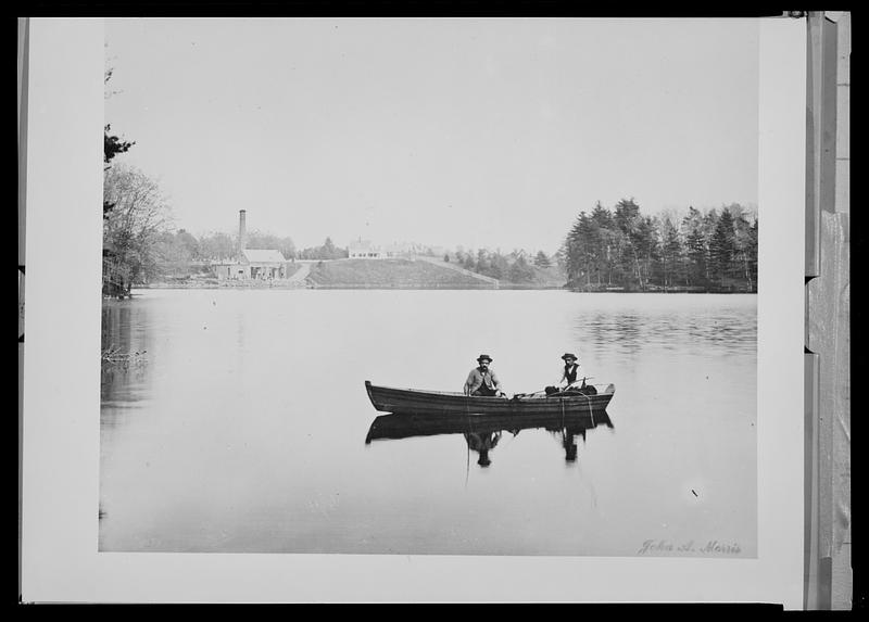 Two fishermen in boat on Dug Pond - Digital Commonwealth