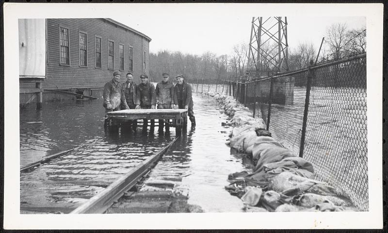 Pepperell Paper Mill flood damage with trestle and flooded railroad ...