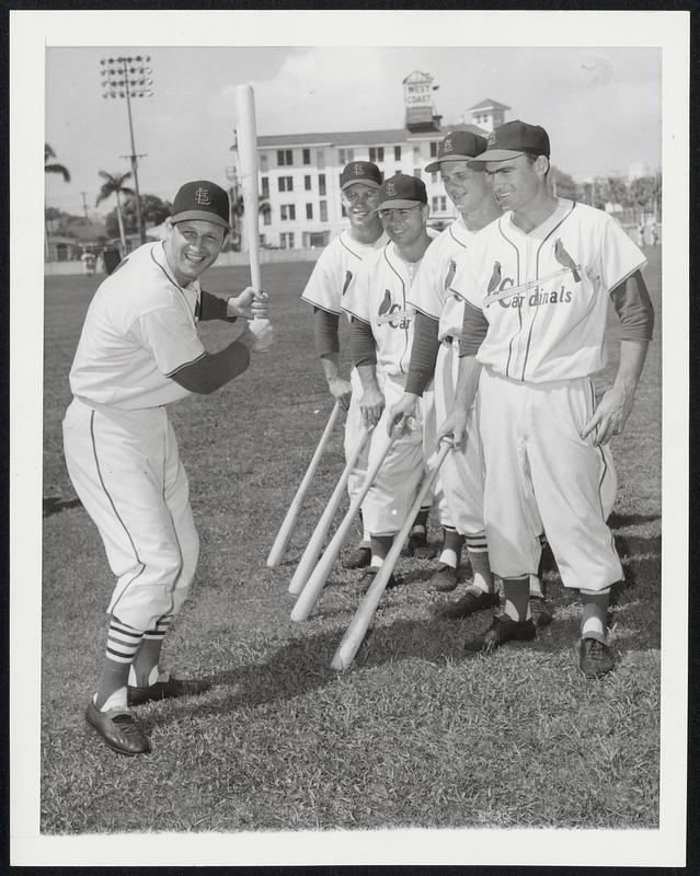 The Man Shows ‘Em. Stan (The Man) Musial shows four of his outfielding ...