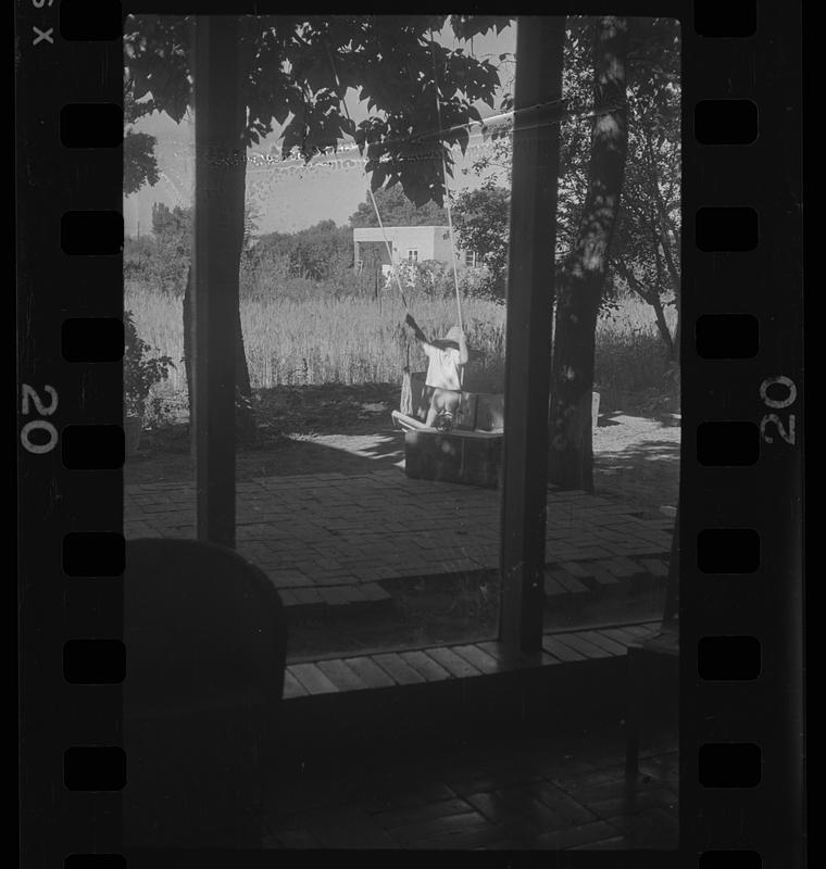 Emily Bunting on tree swing - Digital Commonwealth