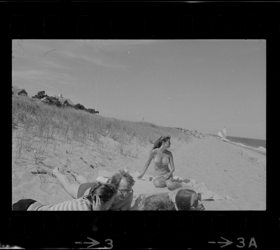 Group Sunbathing And Relaxing On A Beach Digital Commonwealth
