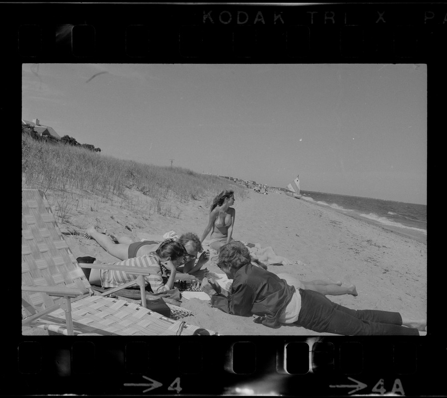 Group Sunbathing And Relaxing On A Beach Digital Commonwealth
