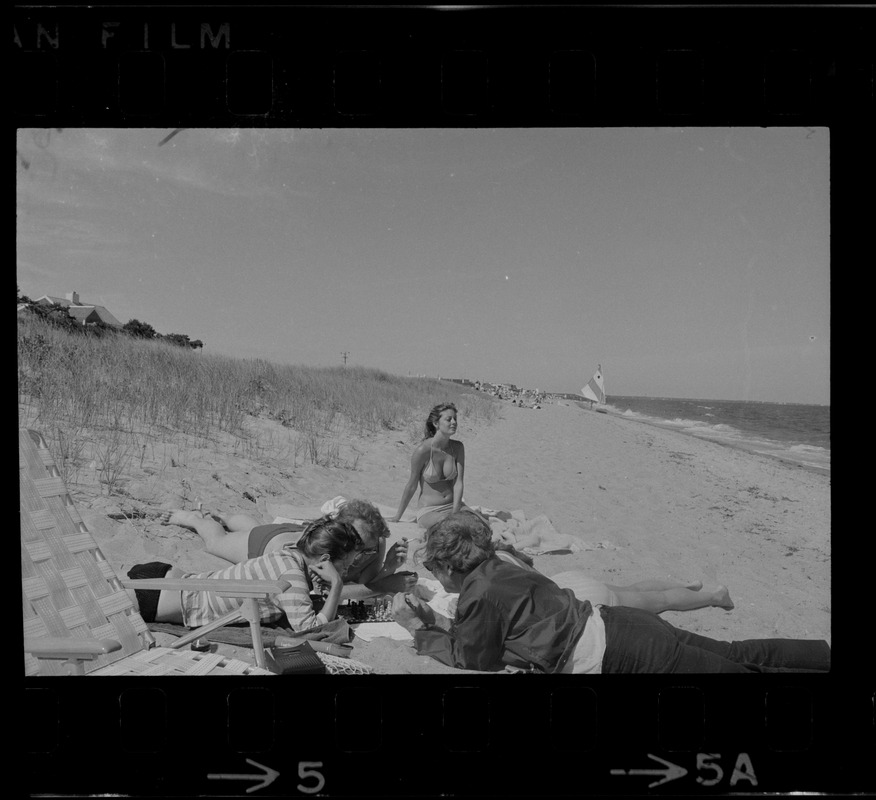 Group Sunbathing And Relaxing On A Beach Digital Commonwealth