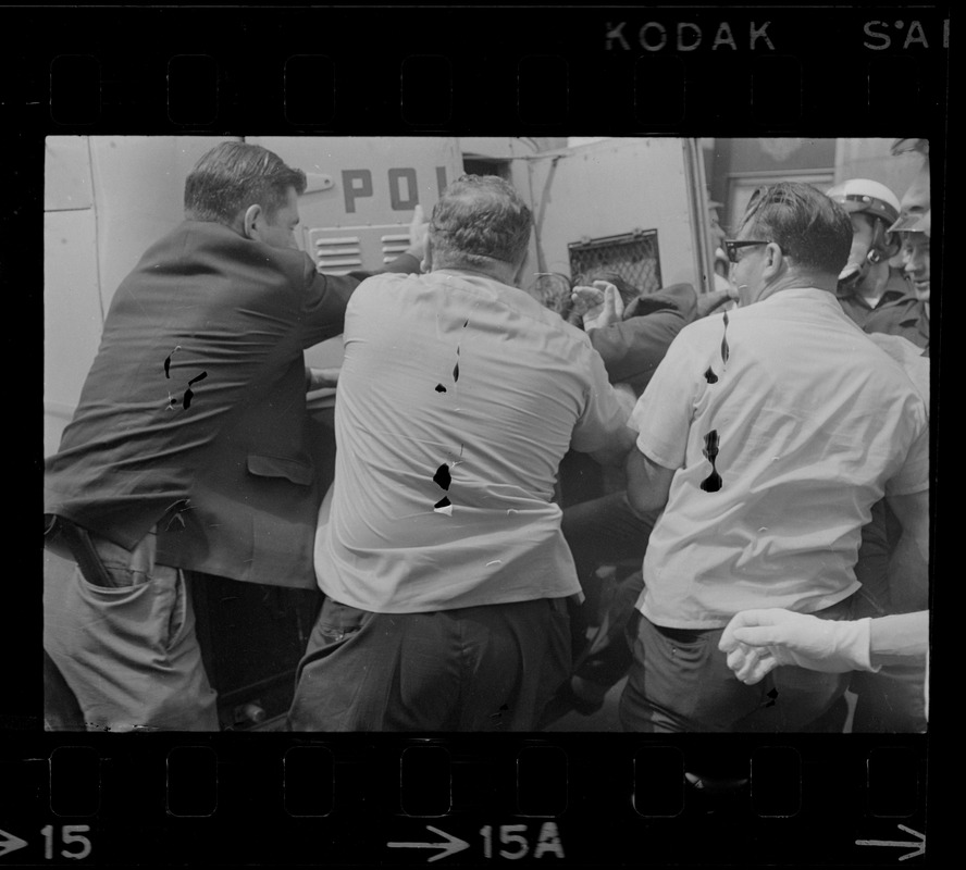 Josef Mlot-Mroz being apprehended during protests after the sentencing ...