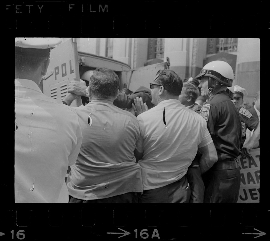Josef Mlot-Mroz being apprehended during protests after the sentencing ...