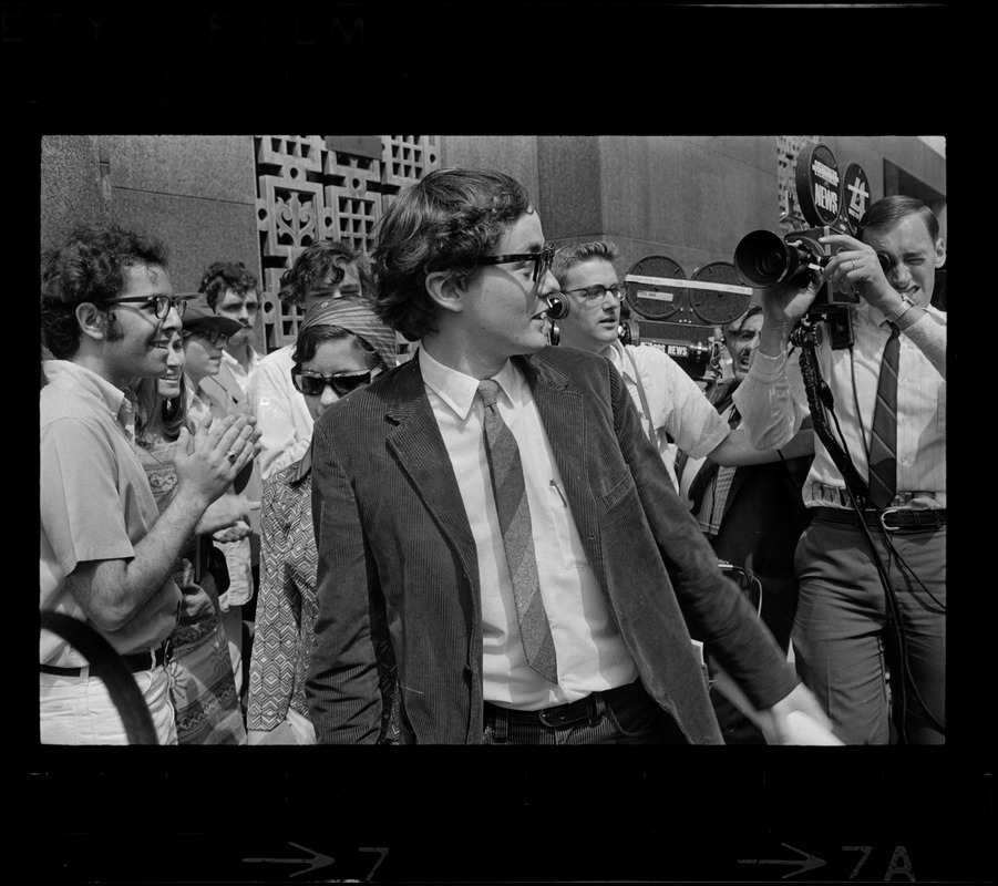 Michael Ferber, Harvard graduate student, surrounded by crowds outside ...