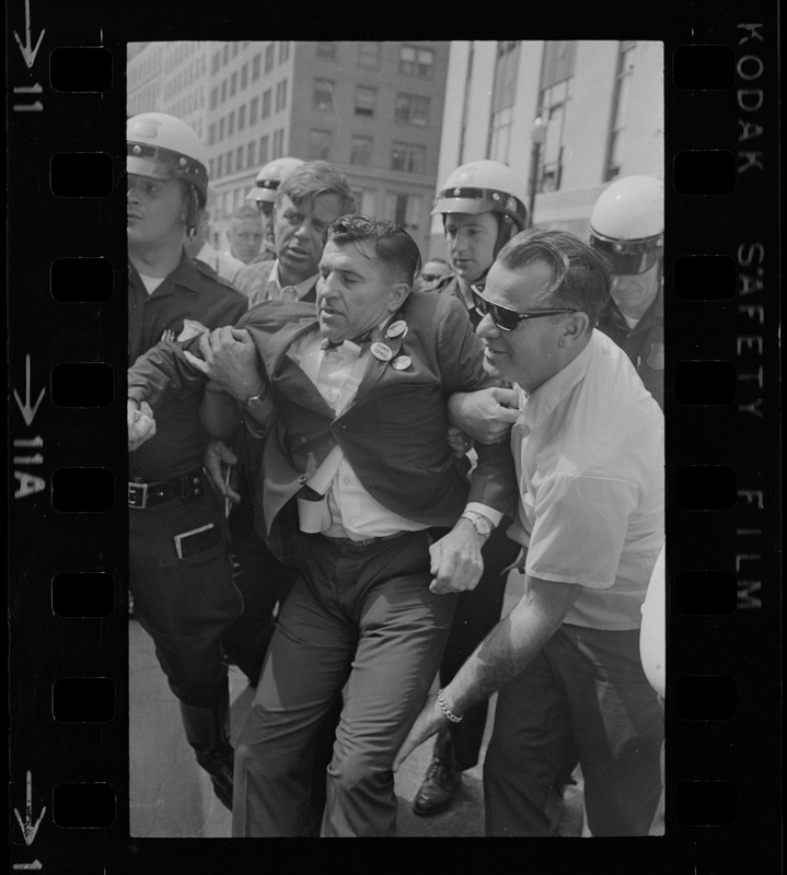 Josef Mlot-Mroz being apprehended during protests after the sentencing ...