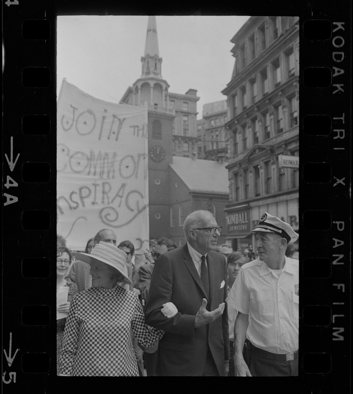 Dr. Benjamin Spock, center, walking with his wife Jane, left, and a ...