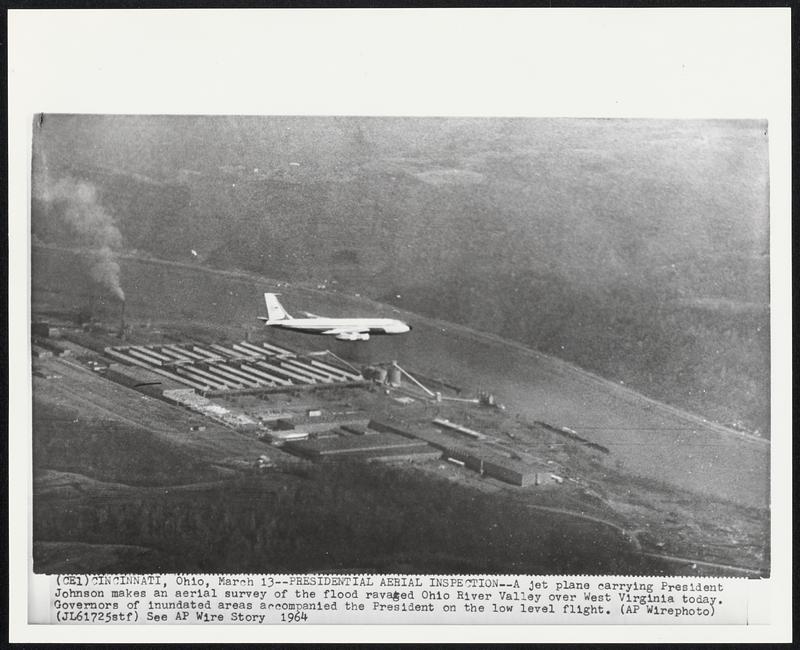 Presidential Aerial Inspection--A jet plane carrying President Johnson ...