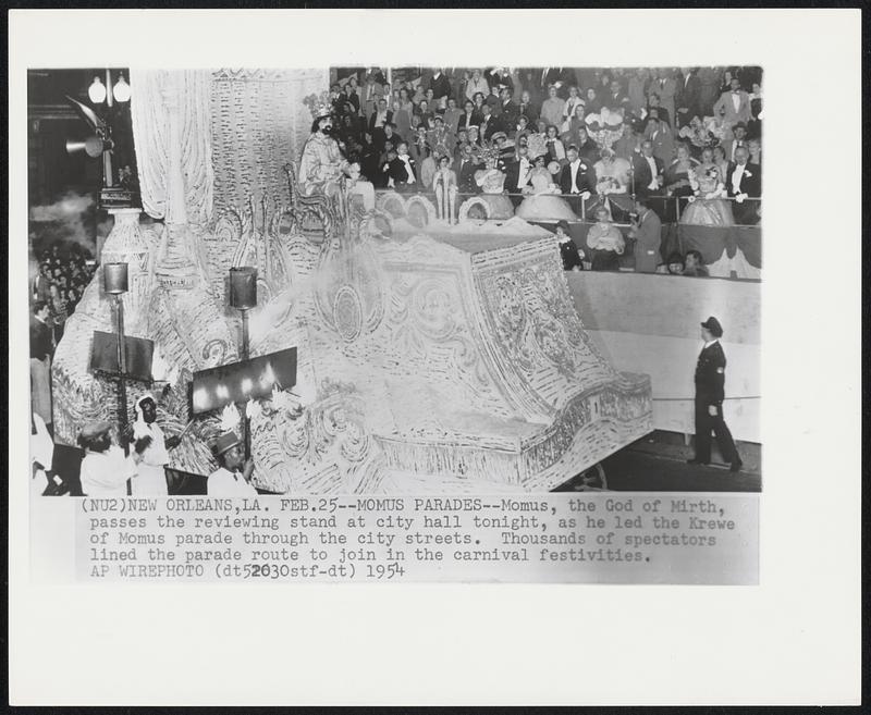 Momus Parades -- Momus, the God of Mirth, passes the reviewing stand at ...