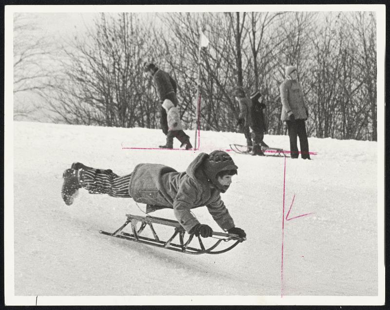 Parting Company - This youngster and sled part company as he flys over ...