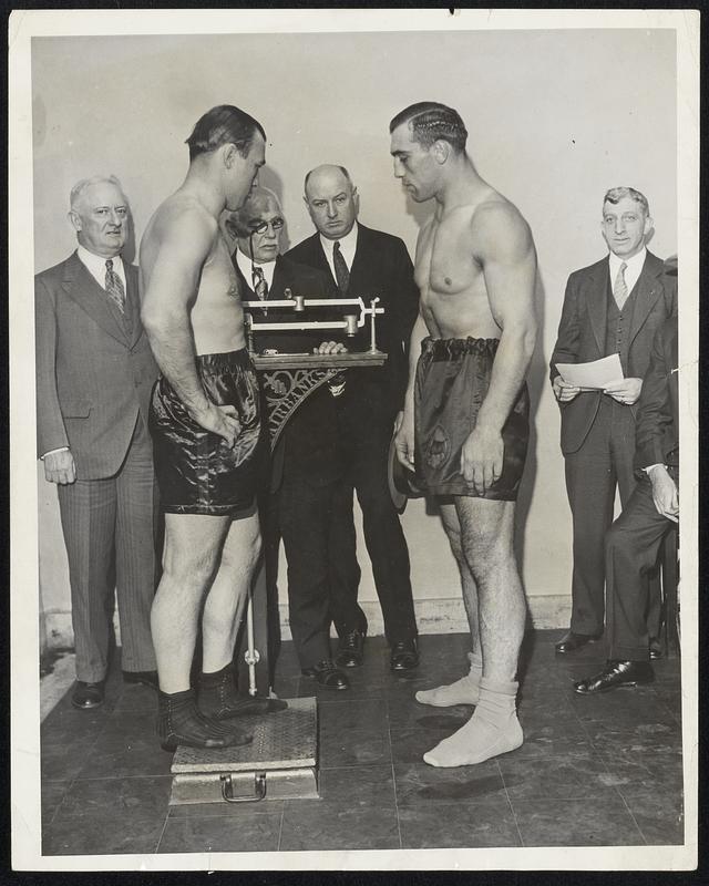 Ready for Clash. Jack Sharkey is shown standing on the scales in New ...
