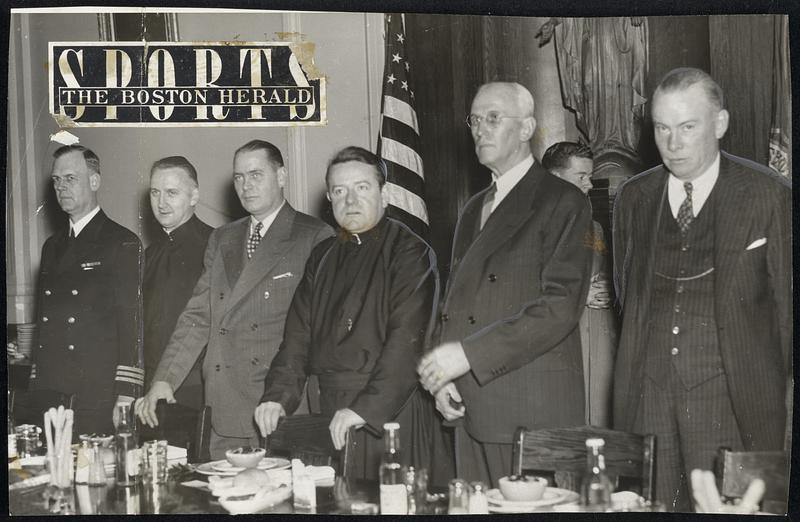 Greeting New Holy Cross Coach-Left to right, Com. Charles J. Wheeler, R ...