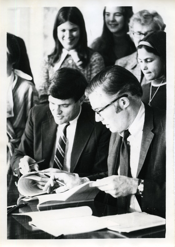 Don Gordon and Ted Sizer prepare to sign the Articles and Agreement of ...
