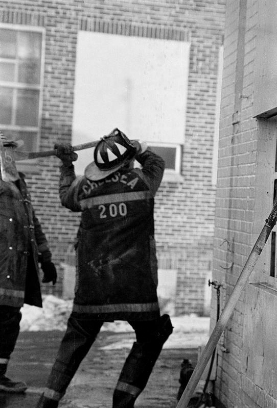 Chelsea firefighter Louis Addonizzio taking out a window on the Bravo ...