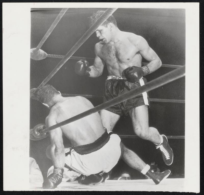The Champ Makes a Boo Boo--Rocky Marciano grabs for ropes after ...
