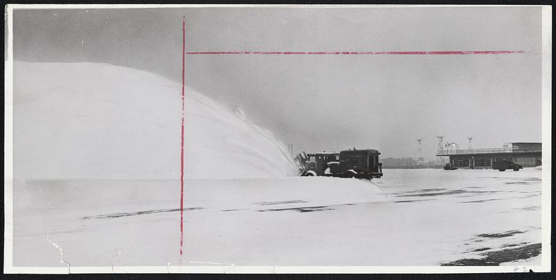 Go, Snow! -- Four snowblowers like machine pictured here were kept busy ...