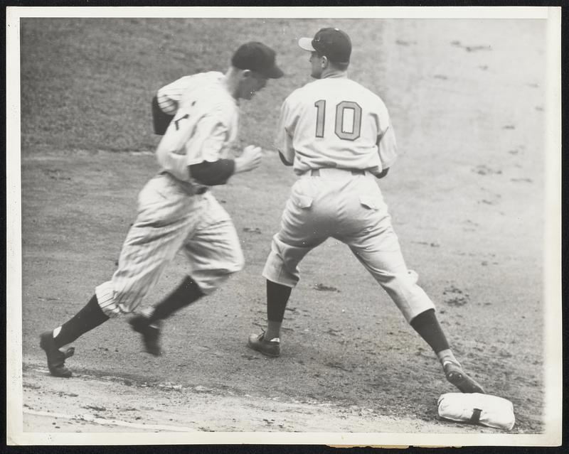 Rolfe out at first -- Red Rolfe, Yankee third baseman, raced to first ...