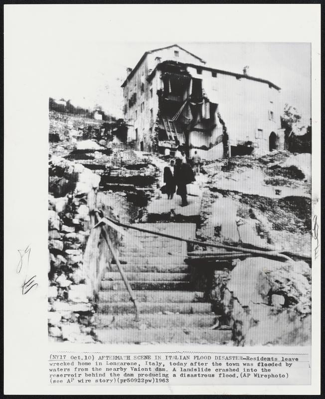 Aftermath in Italian Flood Disaster-Residents leave wrecked home in ...