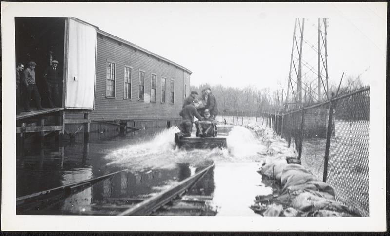 Pepperell Paper Mill flood damage with trestle and flooded railroad ...