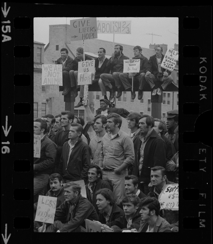 Signs show the demands during Norfolk Prison protest - Digital Commonwealth