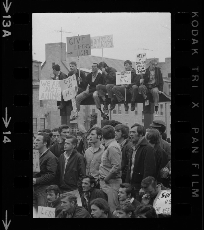 Signs show the demands during Norfolk Prison protest - Digital Commonwealth