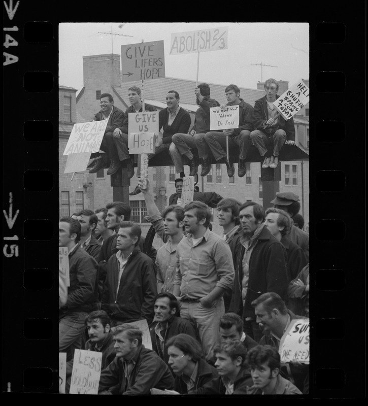 Signs show the demands during Norfolk Prison protest - Digital Commonwealth