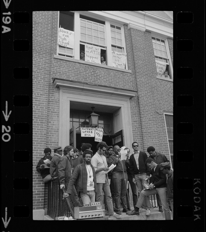 Signs show the demands during Norfolk Prison protest - Digital Commonwealth