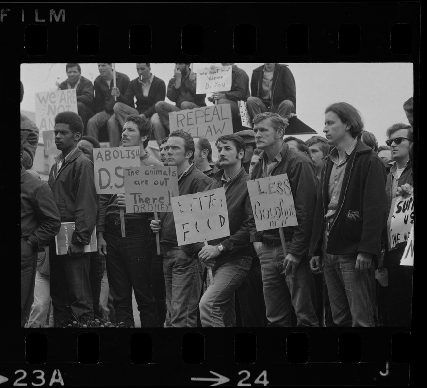 Signs show the demands during Norfolk Prison protest - Digital Commonwealth