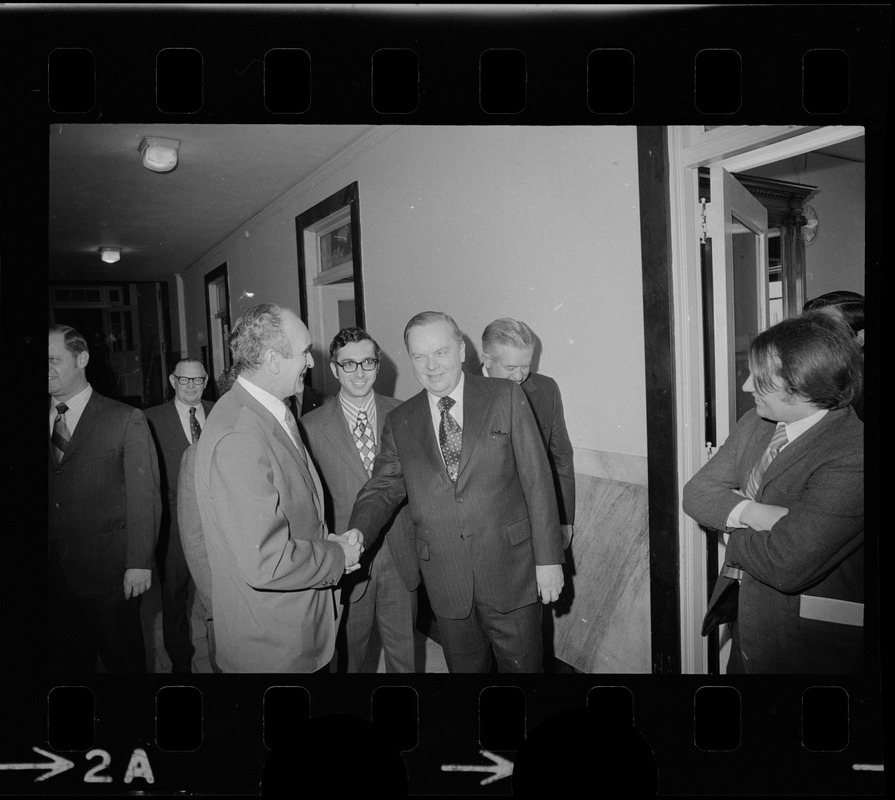 Massachusetts State Representative Sidney Curtiss, right, shakes hand of unidentified man ...