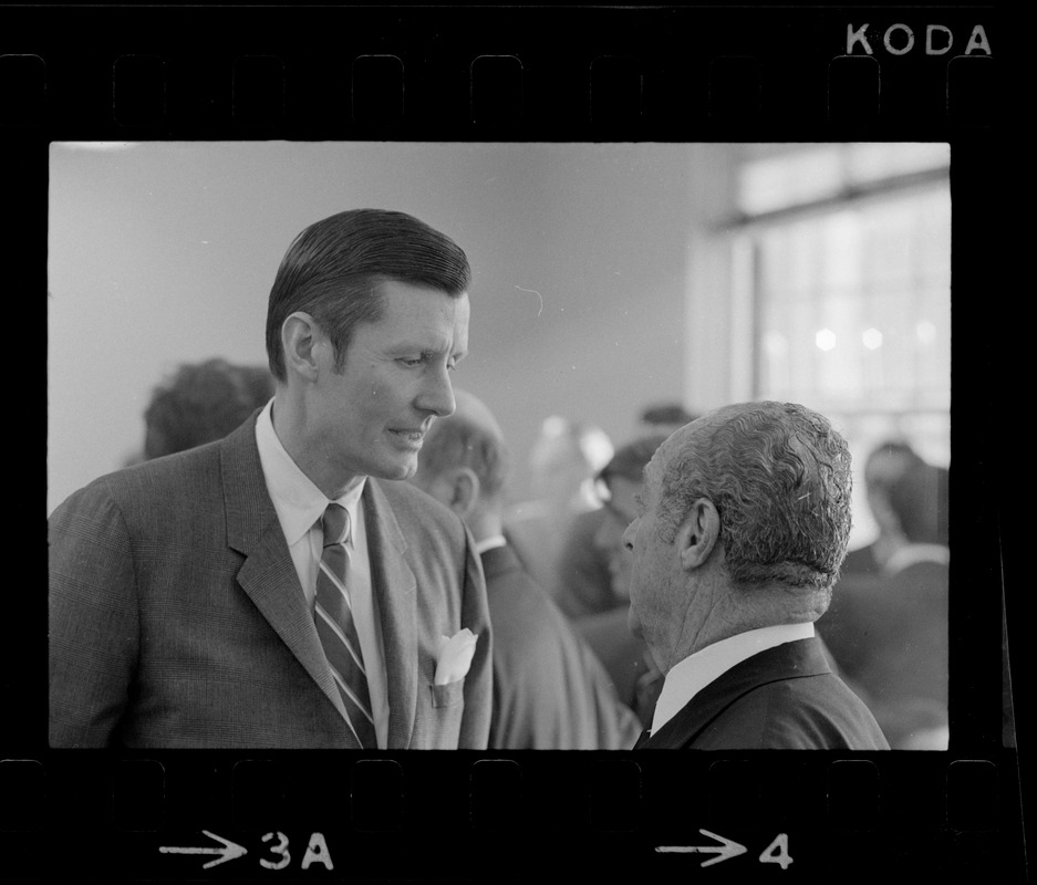 House Minority Leader Francis Hatch speaking unidentified man at ...