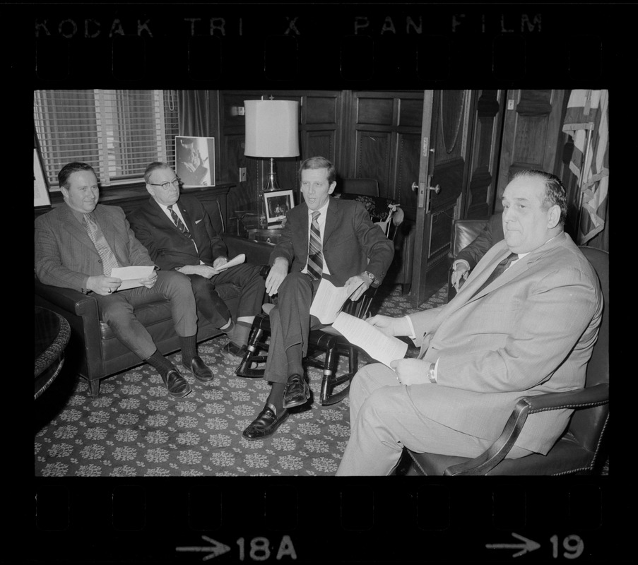 House Speaker David Bartley and Newton Mayor Monte Basbas with two unidentified men at meeting ...