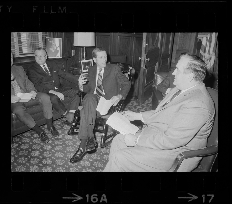House Speaker David Bartley and Newton Mayor Monte Basbas with two unidentified men at meeting ...