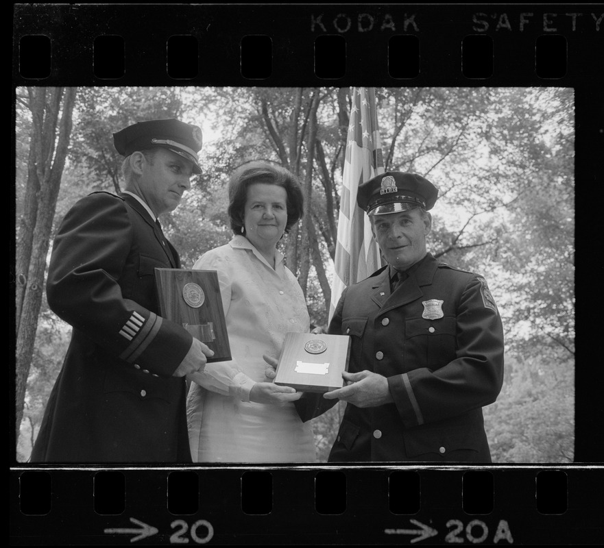 Congresswoman Louise Day Hicks is flanked by Boston Police Capt ...