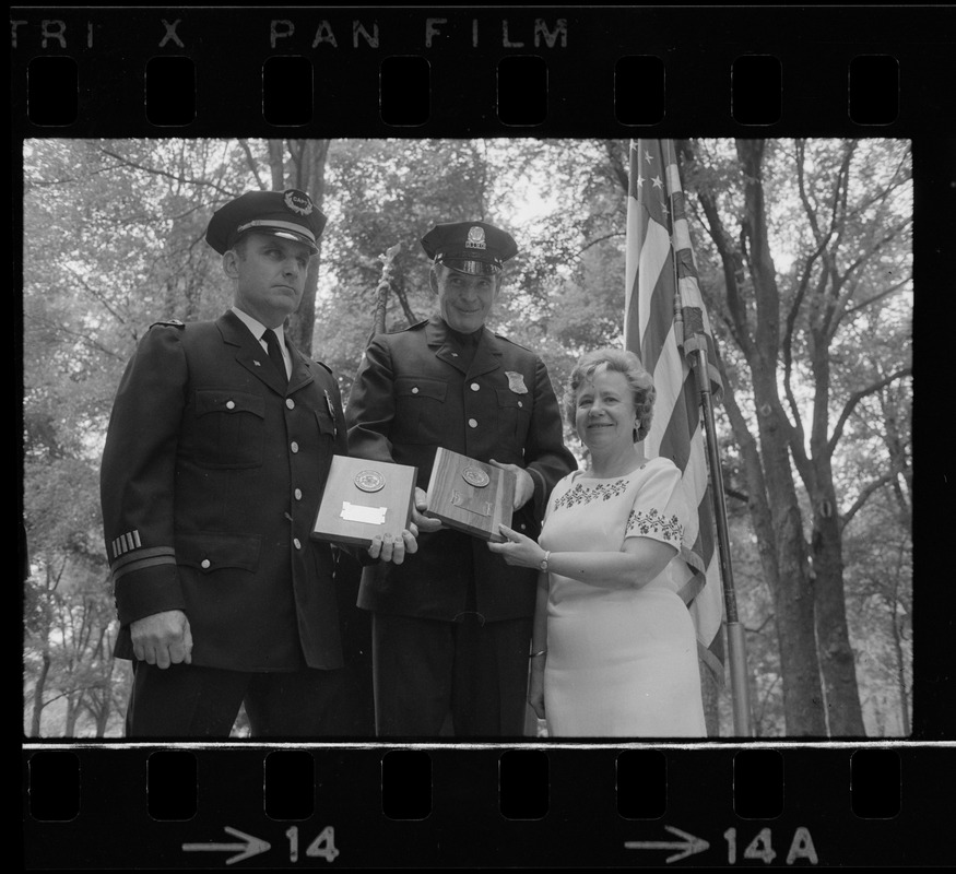 Boston Police Capt. Charles Barry, left, officer John Corbett, and ...