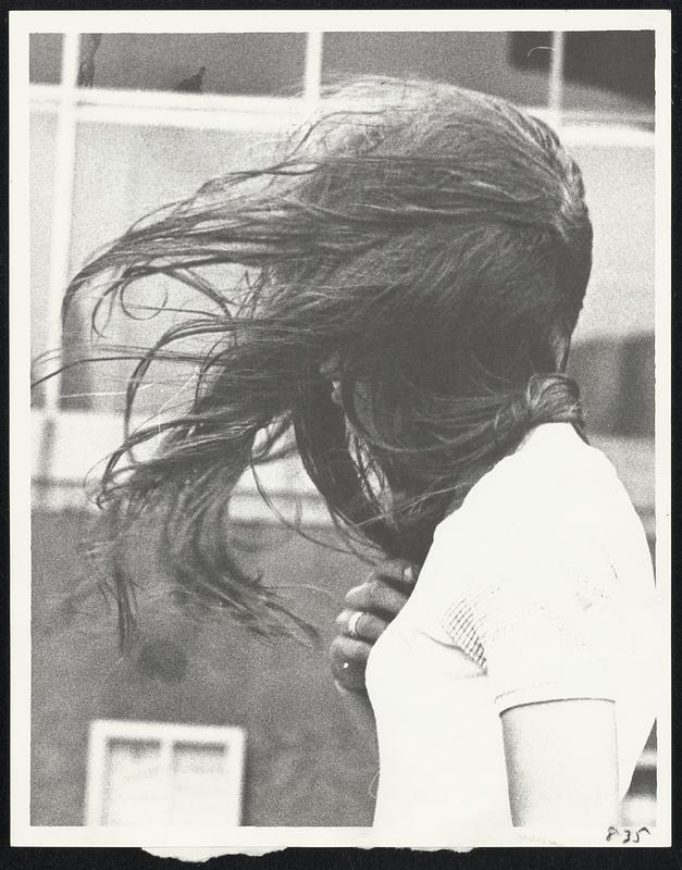 Backing into wind, girl makes her way through Prudential Center during ...