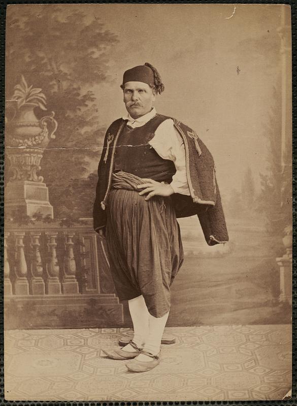 Studio portrait of man in traditional Greek dress - Digital Commonwealth