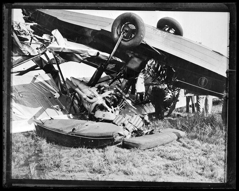 Airplane wrecked upside down - Digital Commonwealth