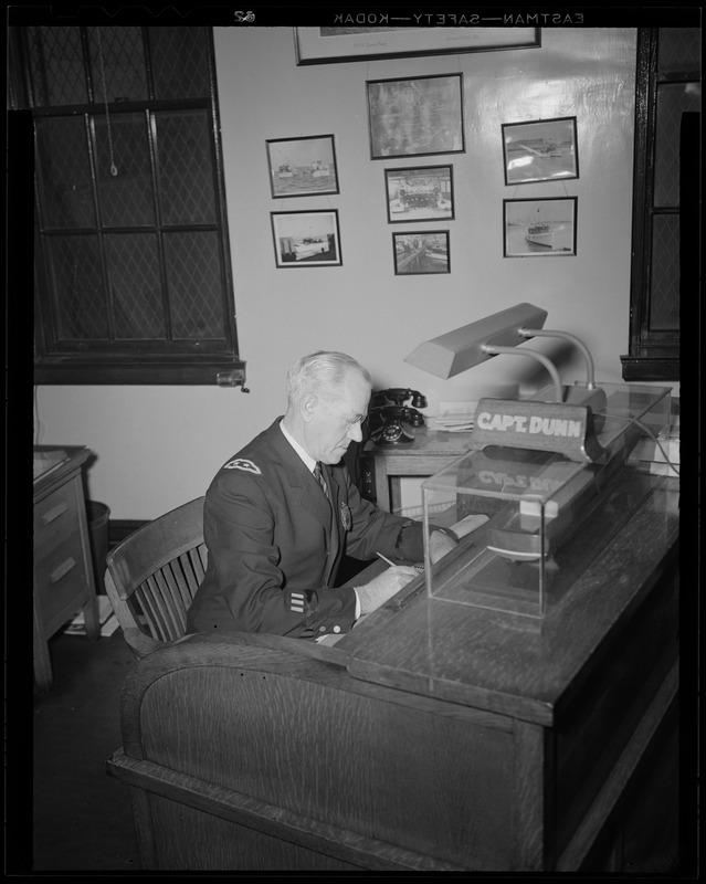 Captain Dunn at his desk - Digital Commonwealth