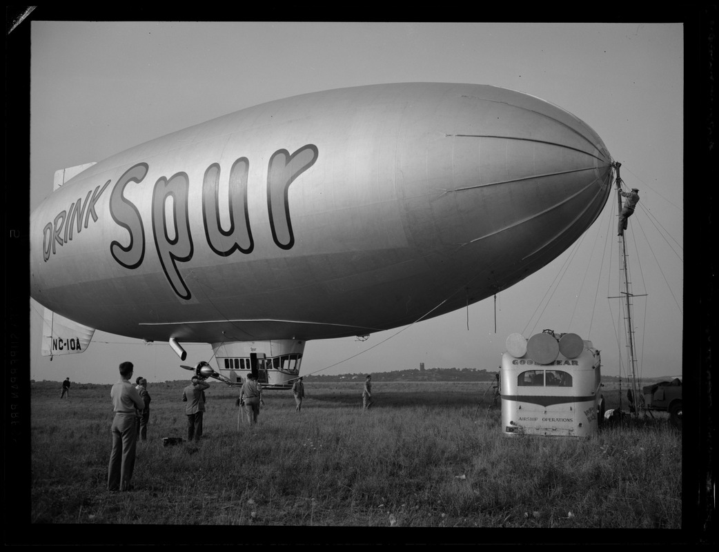 Blimp branded "Drink Spur" tied to tower - Digital Commonwealth