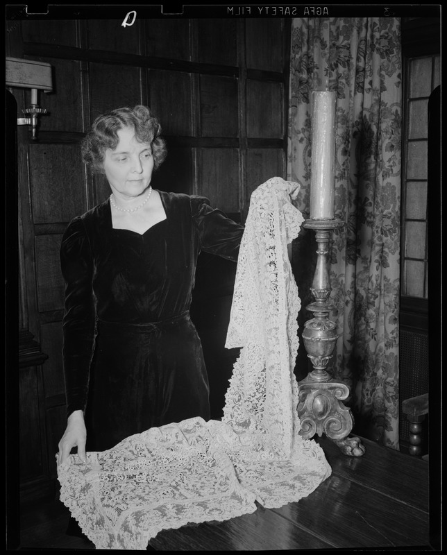 Woman modeling old English lace - Digital Commonwealth