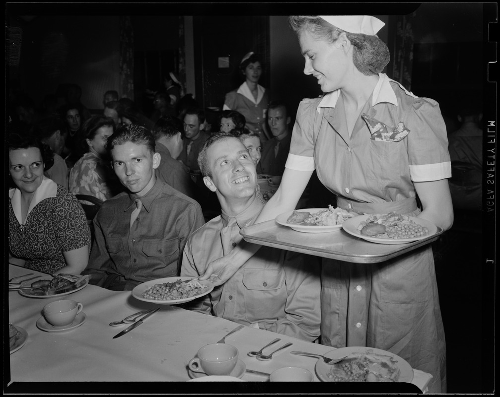 Red Cross volunteer serving food - Digital Commonwealth