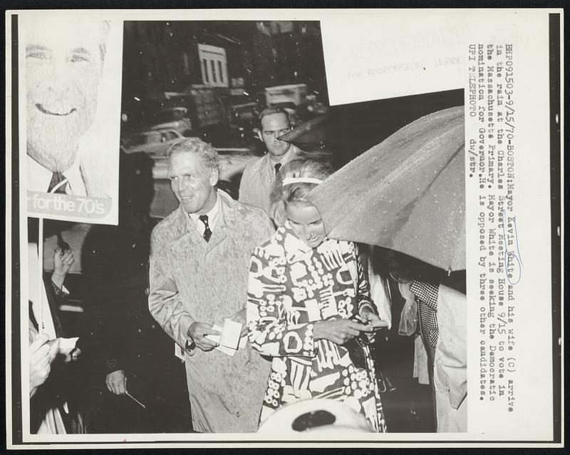 Mayor Kevin White and his wife (C) arrive in the rain at the Charles ...