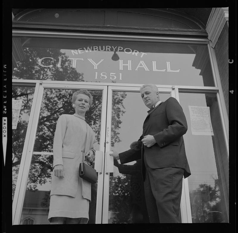 Mr. and Mrs. Norman Doyle on city hall steps - Digital Commonwealth
