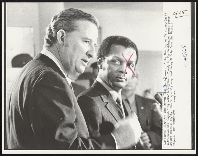 Bob Short, owner of the Washington Senators, (left) introduces his ...