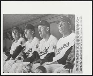 Slugging Senators -- Side-by-side in the dugout in the eight inning are ...