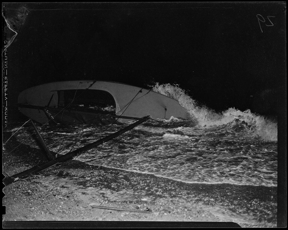 Boat turned over on its side - Digital Commonwealth